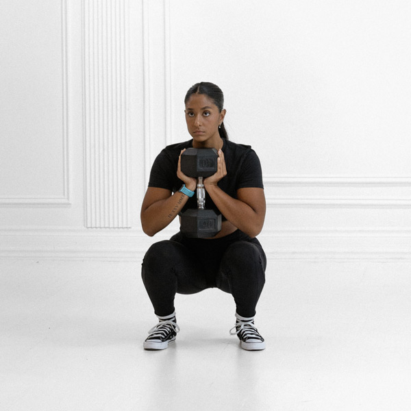 Dumbbell Goblet Squat - Exercise Guide | Motra