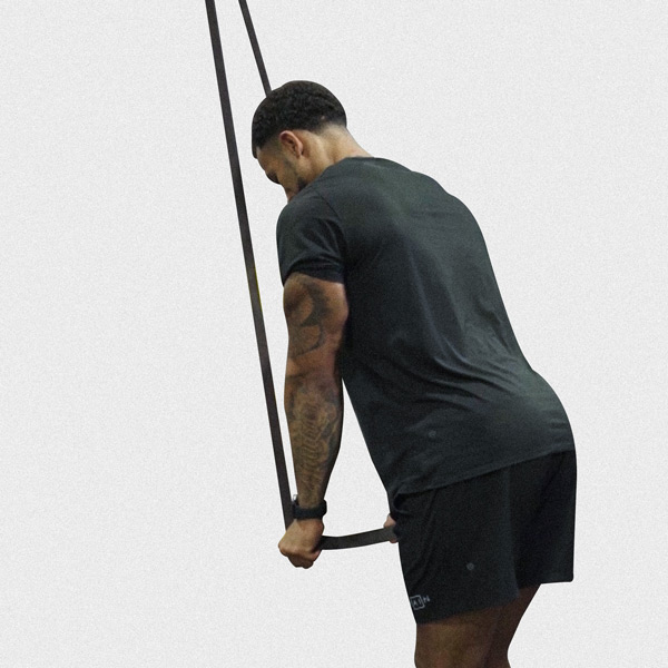 Resistance Band Tricep Pushdown - Exercise Guide | Motra