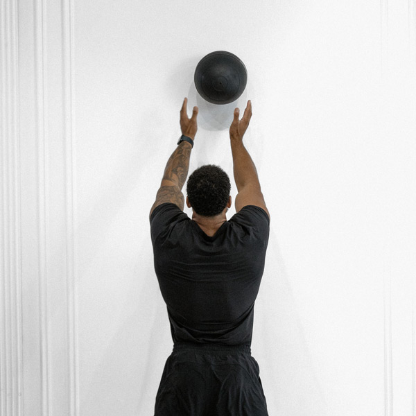 Medicine Ball Wall Balls - Exercise Guide | Motra