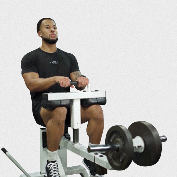 Machine Seated Calf Raise - Exercise Guide | Motra
