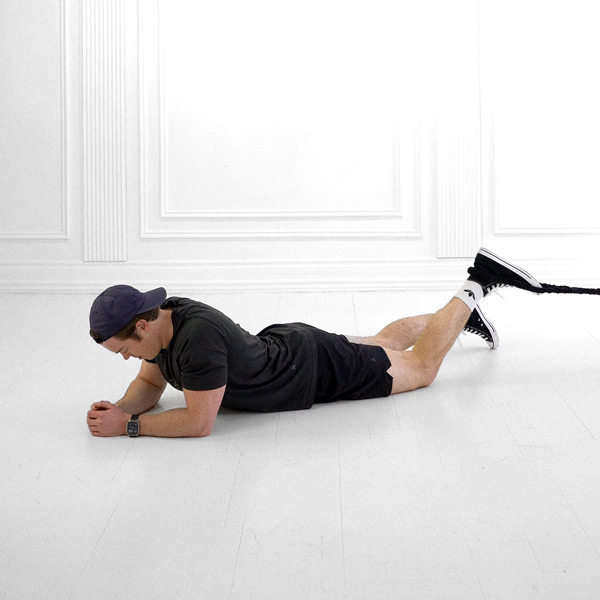 Resistance Band Hamstring Curl - Exercise Guide | Motra