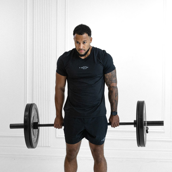 Barbell Behind Back Shrug - Exercise Guide | Motra