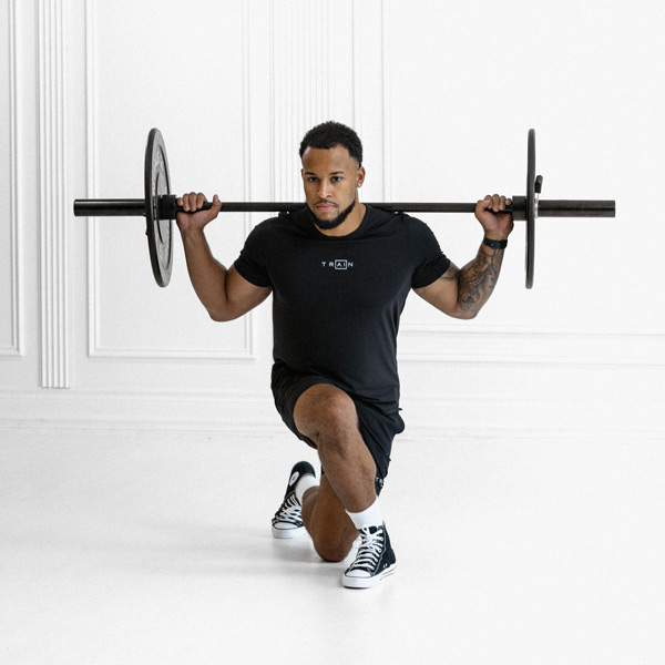 Barbell Curtsy Lunge - Exercise Guide | Motra